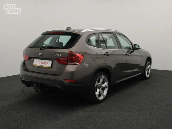 Brown BMW X1 2015 in Vilnius, with an engine capacity of 2.00 L and mileage of 251 thousand km for 10699 €, photo 8 on AUTOMOTO.COM.LV