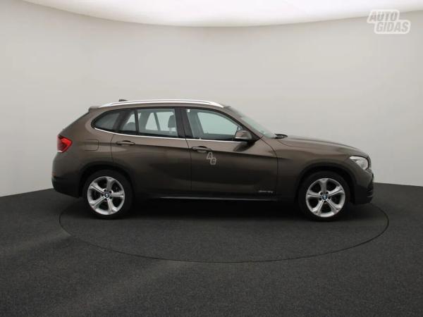 Brown BMW X1 2015 in Vilnius, with an engine capacity of 2.00 L and mileage of 251 thousand km for 10699 €, photo 9 on AUTOMOTO.COM.LV