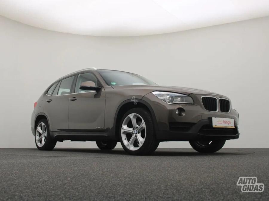 Brown BMW X1 2015 in Vilnius, with an engine capacity of 2.00 L and mileage of 251 thousand km for 10699 €, photo 12 on AUTOMOTO.COM.LV