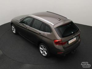 Brown BMW X1 2015 in Vilnius, with an engine capacity of 2.00 L and mileage of 251 thousand km for 10699 €, photo 13 on AUTOMOTO.COM.LV