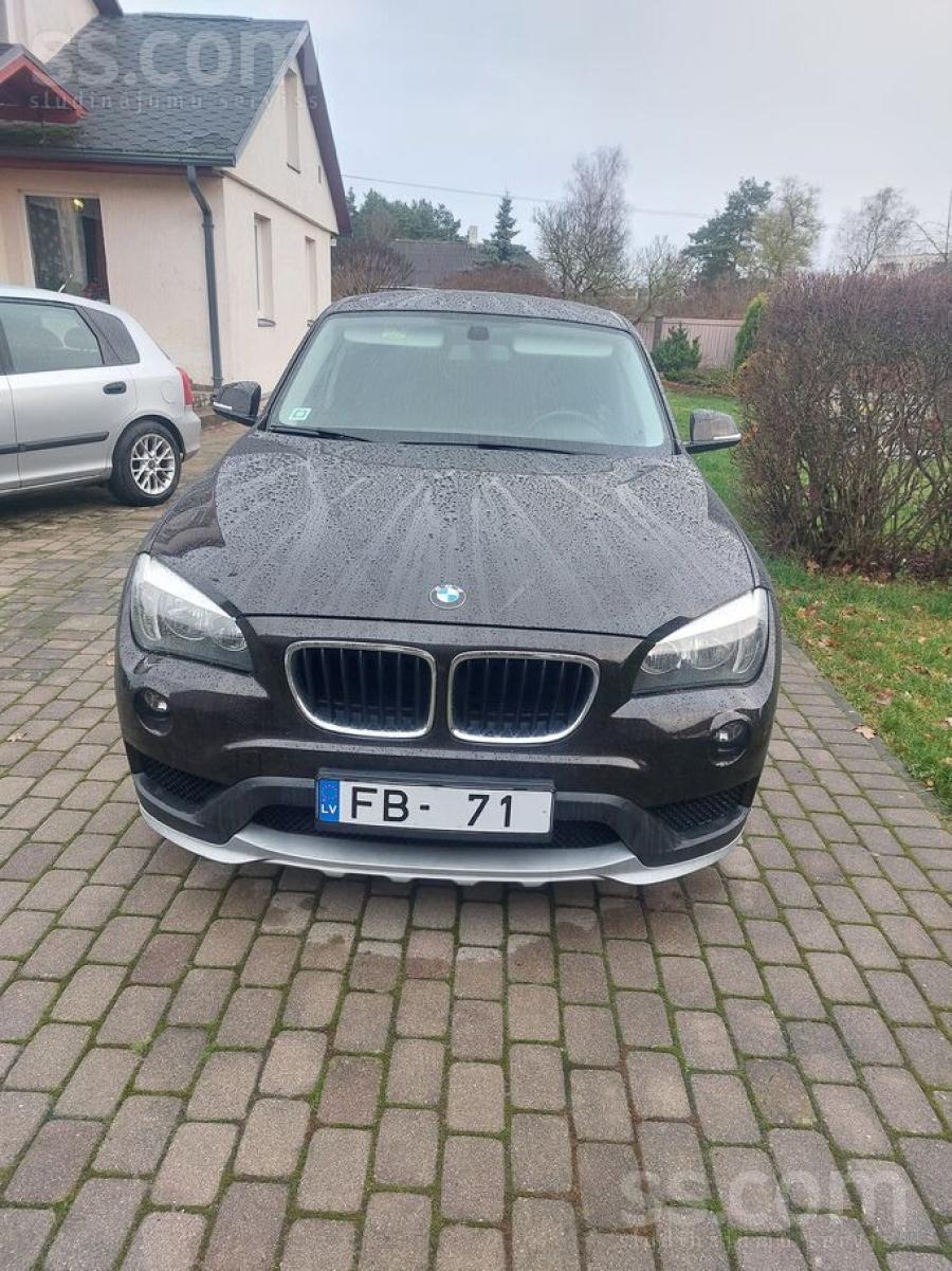 Brown BMW X1 2015 in Riga, with an engine capacity of 2.00 L and mileage of 306 thousand km for 6350 €, photo 5 on AUTOMOTO.COM.LV