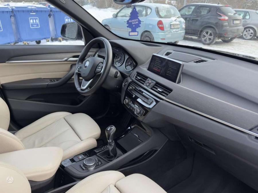 Brown BMW X1 2016 in Prienai, with an engine capacity of 1.50 L and mileage of 215 thousand km for 11950 €, photo 12 on AUTOMOTO.COM.LV