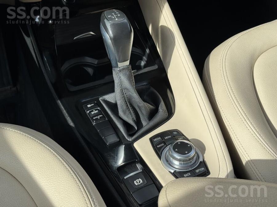 Brown BMW X1 2016 in Riga, with an engine capacity of 1.90 L and mileage of 110 thousand km for 14990 €, photo 8 on AUTOMOTO.COM.LV