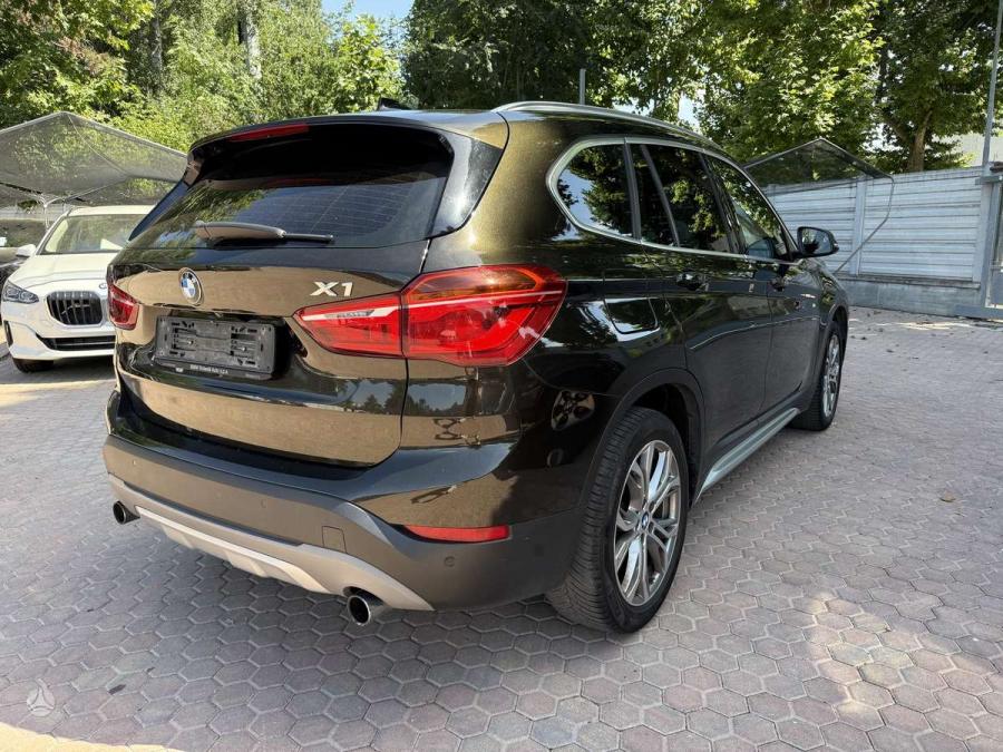 Brown BMW X1 2016 in Siauliai, with an engine capacity of 2.00 L and mileage of 194 thousand km for 13200 €, photo 5 on AUTOMOTO.COM.LV