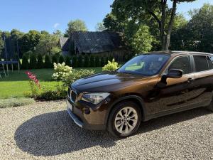 Brown BMW X1 2010 in Siauliai, with an engine capacity of 2.00 L and mileage of 130 thousand km for 6666 €, photo  on AUTOMOTO.COM.LV