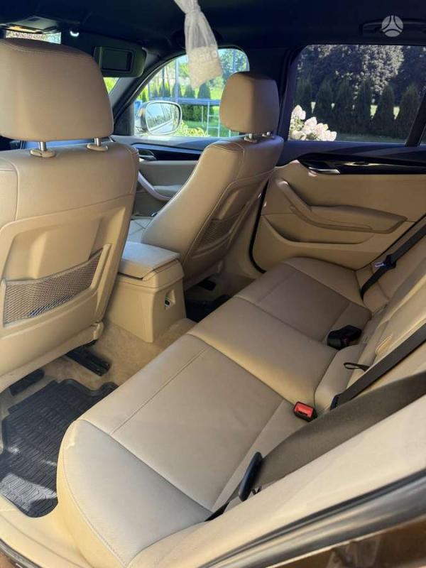 Brown BMW X1 2010 in Siauliai, with an engine capacity of 2.00 L and mileage of 130 thousand km for 6666 €, photo 4 on AUTOMOTO.COM.LV