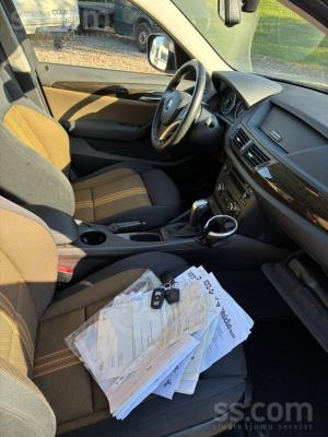 Brown BMW X1 2010 in Valmiera, with an engine capacity of 2.00 L and mileage of 239 thousand km for 6190 €, photo 6 on AUTOMOTO.COM.LV