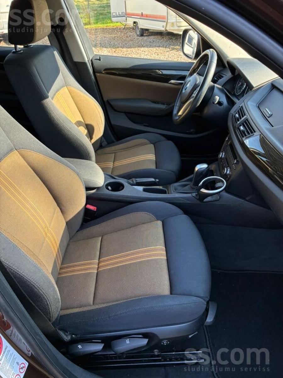 Brown BMW X1 2010 in Valmiera, with an engine capacity of 2.00 L and mileage of 239 thousand km for 6190 €, photo 7 on AUTOMOTO.COM.LV