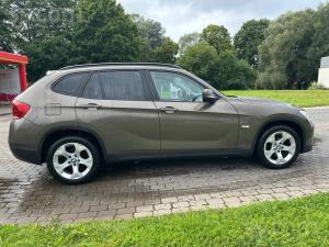 Brown BMW X1 2011 in Riga, with an engine capacity of 2.00 L and mileage of 303 thousand km for 6150 €, photo 4 on AUTOMOTO.COM.LV