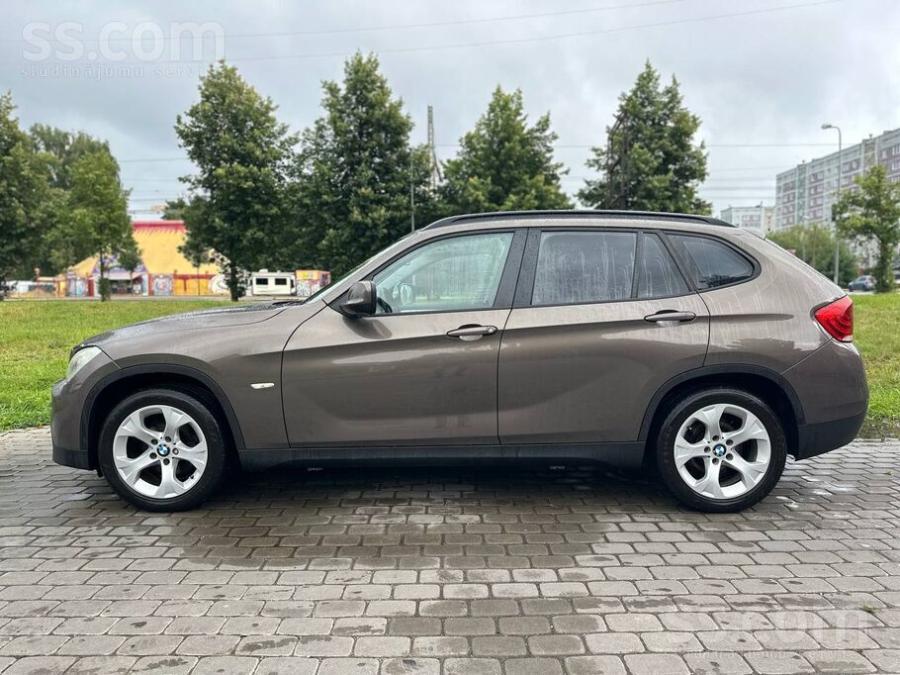 Brown BMW X1 2011 in Riga, with an engine capacity of 2.00 L and mileage of 303 thousand km for 6150 €, photo 5 on AUTOMOTO.COM.LV