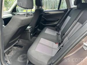 Brown BMW X1 2011 in Riga, with an engine capacity of 2.00 L and mileage of 303 thousand km for 6150 €, photo 8 on AUTOMOTO.COM.LV