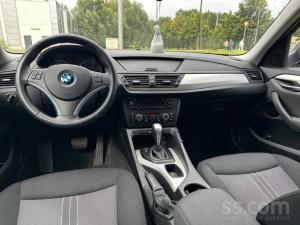 Brown BMW X1 2011 in Riga, with an engine capacity of 2.00 L and mileage of 303 thousand km for 6150 €, photo 9 on AUTOMOTO.COM.LV