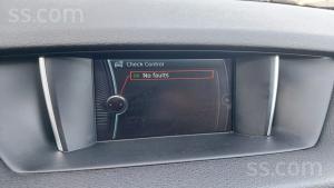 Brown BMW X1 2015 in Riga, with an engine capacity of 2.00 L and mileage of 241 thousand km for 9950 €, photo 14 on AUTOMOTO.COM.LV