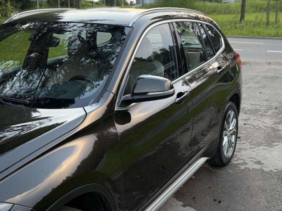 Brown BMW X1 2016 in Utena, with an engine capacity of 2.00 L and mileage of 266 thousand km for 12500 €, photo 13 on AUTOMOTO.COM.LV