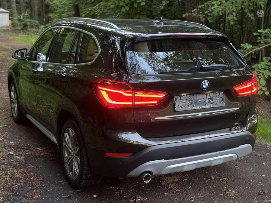 Brown BMW X1 2016 in Utena, with an engine capacity of 2.00 L and mileage of 266 thousand km for 12500 €, photo 21 on AUTOMOTO.COM.LV