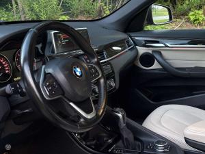 Brown BMW X1 2016 in Utena, with an engine capacity of 2.00 L and mileage of 266 thousand km for 12500 €, photo 24 on AUTOMOTO.COM.LV