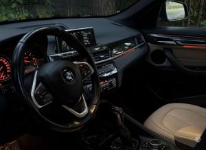 Brown BMW X1 2016 in Utena, with an engine capacity of 2.00 L and mileage of 266 thousand km for 12500 €, photo 32 on AUTOMOTO.COM.LV
