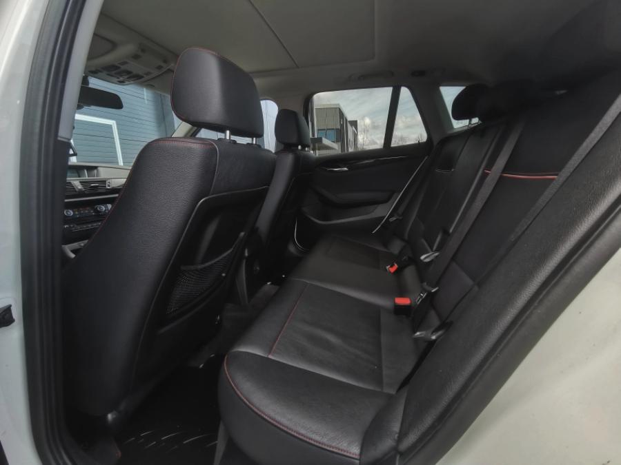 BMW X1 2013 in Riga, with an engine capacity of 2.00 L and mileage of 243 thousand km for 10990 €, photo 4 on AUTOMOTO.COM.LV