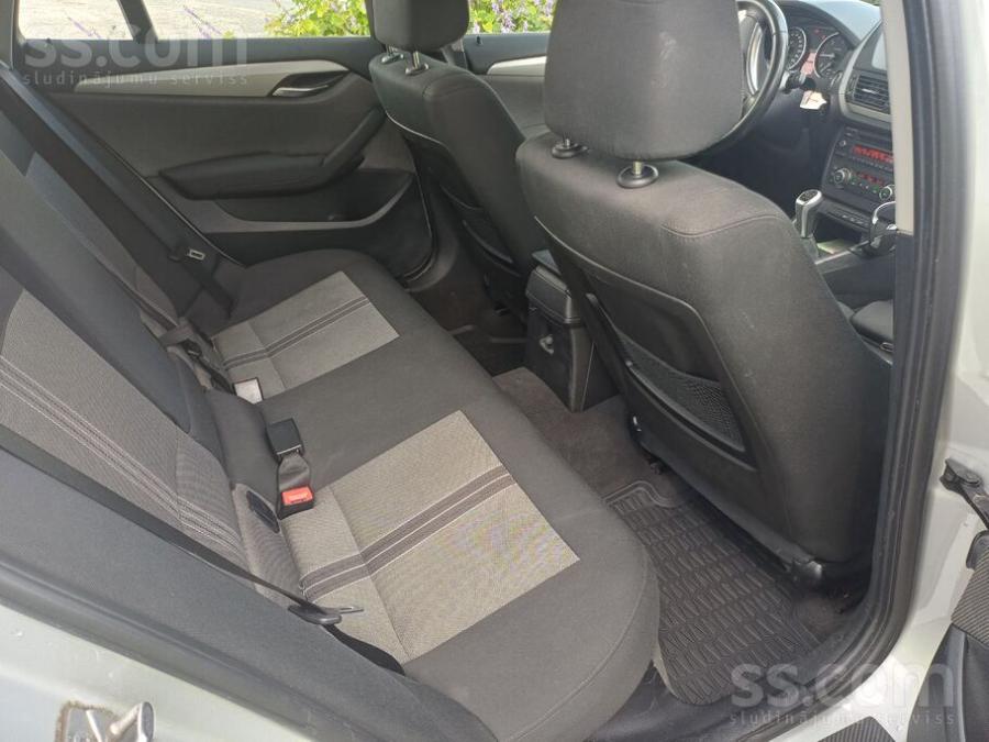 Grey BMW X1 2011 in Valmiera, with an engine capacity of 2.00 L and mileage of 199 thousand km for 7900 €, photo 16 on AUTOMOTO.COM.LV