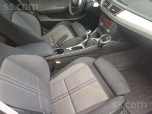 Grey BMW X1 2011 in Valmiera, with an engine capacity of 2.00 L and mileage of 199 thousand km for 7900 €, photo 17 on AUTOMOTO.COM.LV