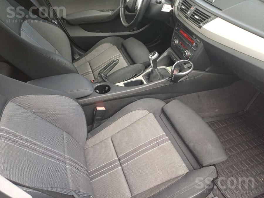 Grey BMW X1 2011 in Valmiera, with an engine capacity of 2.00 L and mileage of 199 thousand km for 7900 €, photo 17 on AUTOMOTO.COM.LV