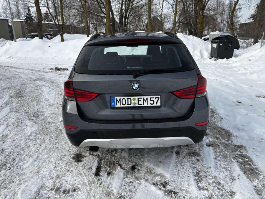 Grey BMW X1 2012 in Panevezys, with an engine capacity of 2.00 L and mileage of 245 thousand km for 8450 €, photo 5 on AUTOMOTO.COM.LV