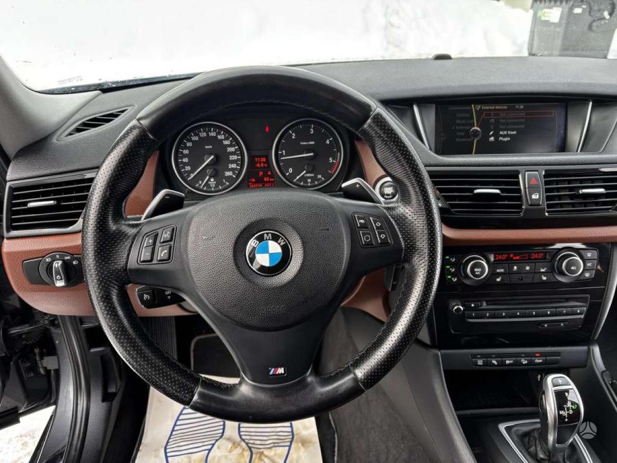 Grey BMW X1 2012 in Panevezys, with an engine capacity of 2.00 L and mileage of 245 thousand km for 8450 €, photo 16 on AUTOMOTO.COM.LV