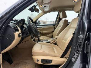Grey BMW X1 2013 in Utena, with an engine capacity of 2.00 L and mileage of 218 thousand km for 8550 €, photo 21 on AUTOMOTO.COM.LV