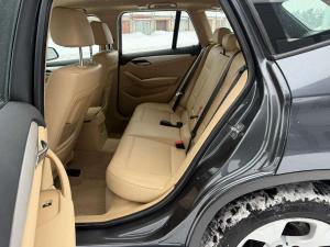 Grey BMW X1 2013 in Utena, with an engine capacity of 2.00 L and mileage of 218 thousand km for 8550 €, photo 25 on AUTOMOTO.COM.LV