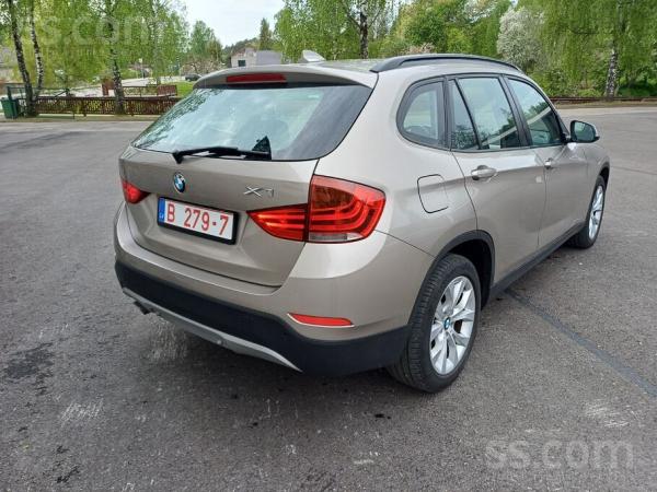 Grey BMW X1 2013 in Valmiera, with an engine capacity of 2.00 L and mileage of 249 thousand km for 7300 €, photo 5 on AUTOMOTO.COM.LV