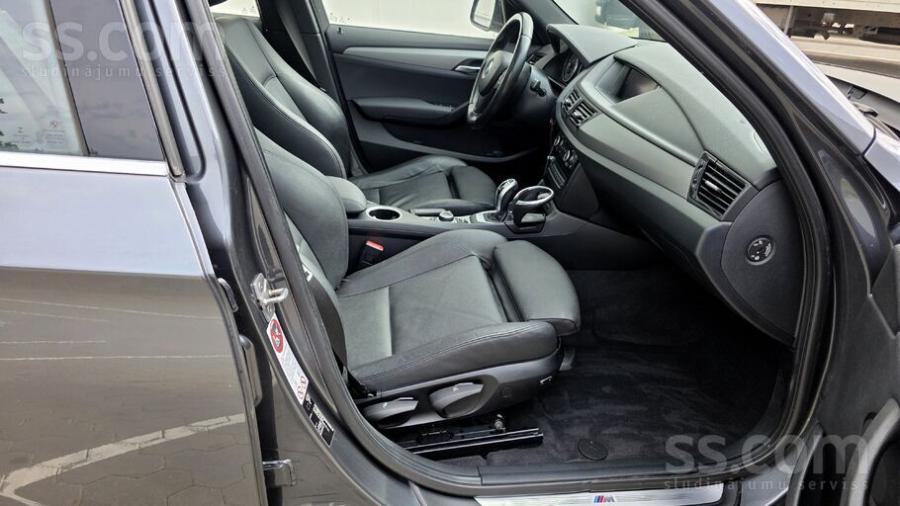 Grey BMW X1 2014 in Riga, with an engine capacity of 2.00 L and mileage of 201 thousand km for 8950 €, photo 12 on AUTOMOTO.COM.LV