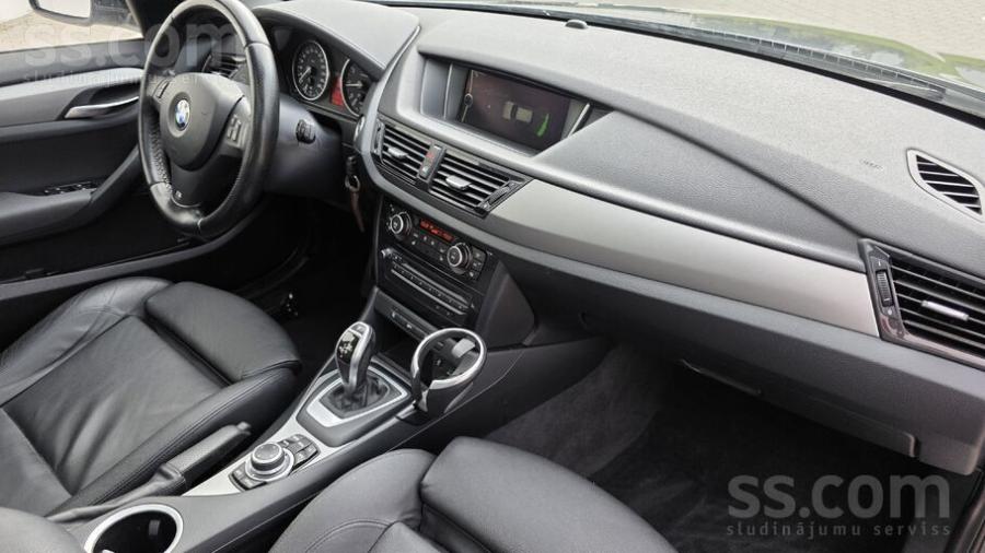 Grey BMW X1 2014 in Riga, with an engine capacity of 2.00 L and mileage of 201 thousand km for 8950 €, photo 15 on AUTOMOTO.COM.LV