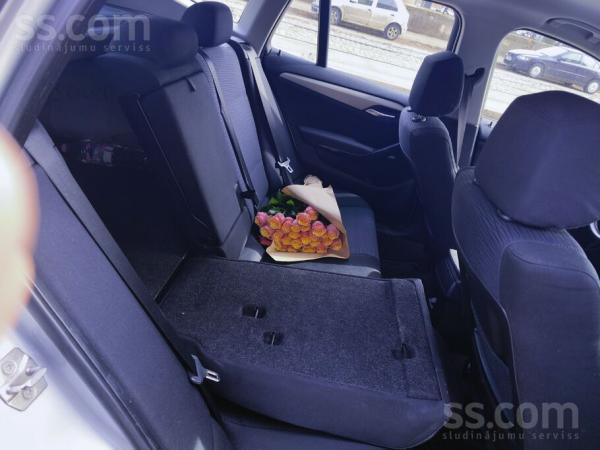 Grey BMW X1 2014 in Riga, with an engine capacity of 2.00 L and mileage of 202 thousand km for 9369 €, photo 6 on AUTOMOTO.COM.LV
