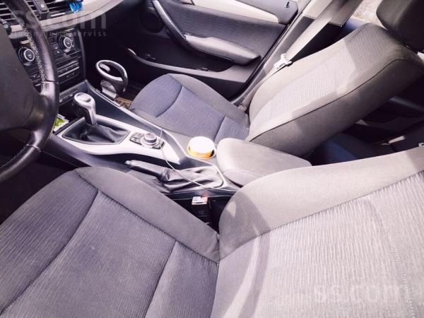 Grey BMW X1 2014 in Riga, with an engine capacity of 2.00 L and mileage of 202 thousand km for 9369 €, photo 8 on AUTOMOTO.COM.LV