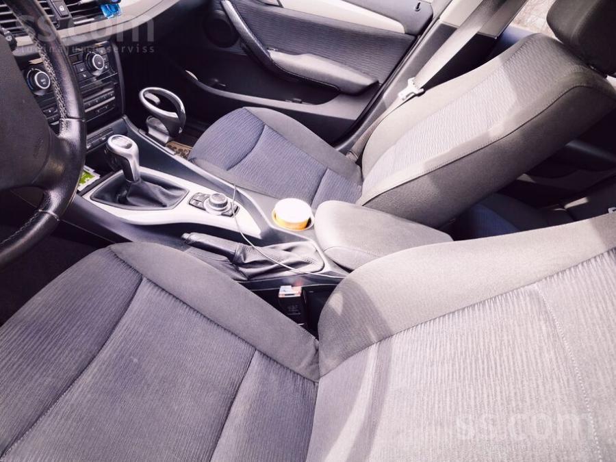 Grey BMW X1 2014 in Riga, with an engine capacity of 2.00 L and mileage of 202 thousand km for 9369 €, photo 9 on AUTOMOTO.COM.LV
