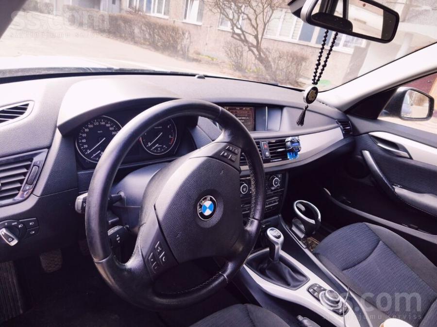Grey BMW X1 2014 in Riga, with an engine capacity of 2.00 L and mileage of 202 thousand km for 9369 €, photo 10 on AUTOMOTO.COM.LV