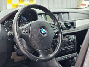 Grey BMW X1 2014 in Siauliai, with an engine capacity of 2.00 L and mileage of 180 thousand km for 7450 €, photo 26 on AUTOMOTO.COM.LV