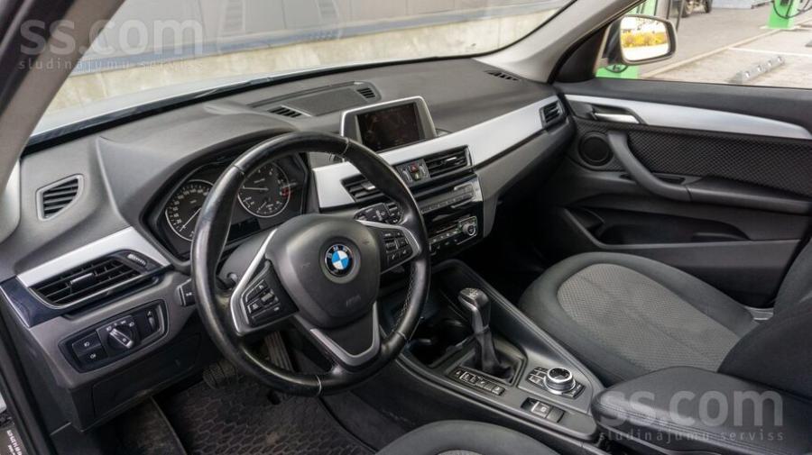 Grey BMW X1 2016 in Riga, with an engine capacity of 2.00 L and mileage of 249 thousand km for 13990 €, photo 11 on AUTOMOTO.COM.LV