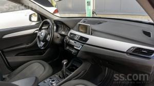 Grey BMW X1 2016 in Riga, with an engine capacity of 2.00 L and mileage of 249 thousand km for 13990 €, photo 12 on AUTOMOTO.COM.LV