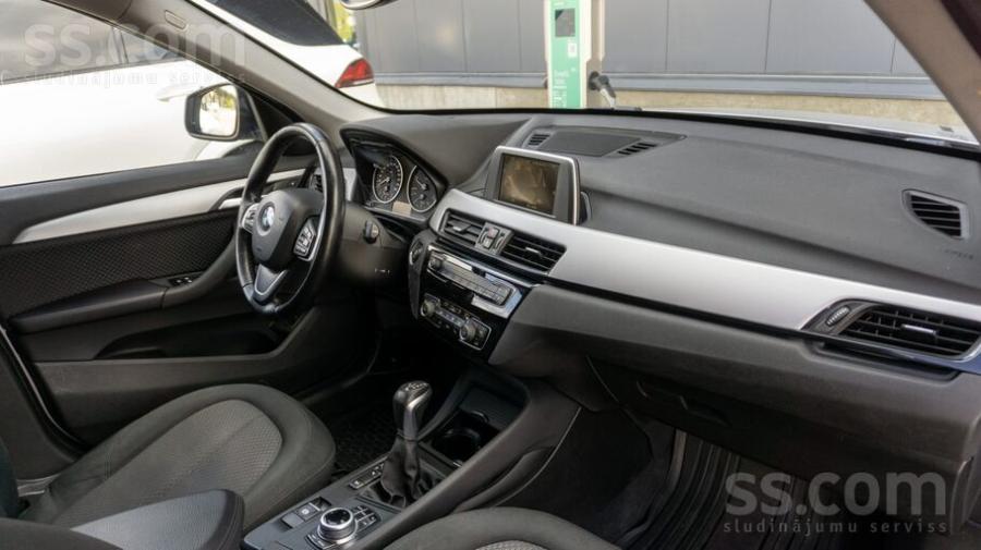 Grey BMW X1 2016 in Riga, with an engine capacity of 2.00 L and mileage of 249 thousand km for 13990 €, photo 12 on AUTOMOTO.COM.LV