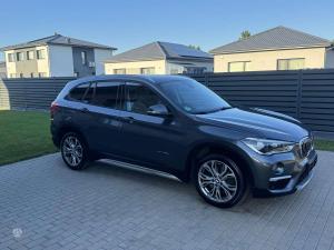 Grey BMW X1 2016 in Kaunas, with an engine capacity of 2.00 L and mileage of 245 thousand km for 12950 €, photo 4 on AUTOMOTO.COM.LV