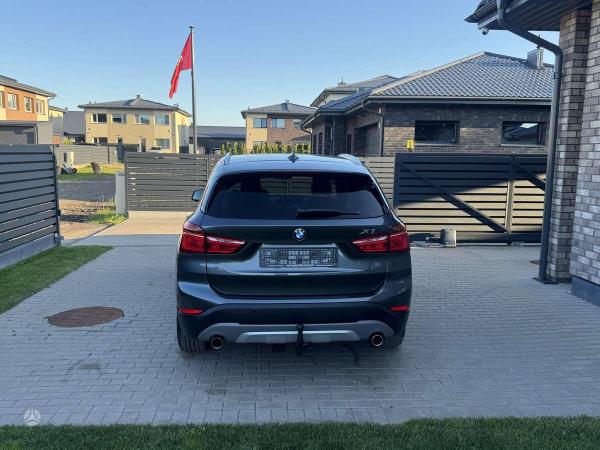 Grey BMW X1 2016 in Kaunas, with an engine capacity of 2.00 L and mileage of 245 thousand km for 12950 €, photo 5 on AUTOMOTO.COM.LV