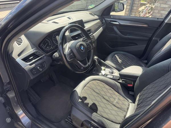 Grey BMW X1 2016 in Kaunas, with an engine capacity of 2.00 L and mileage of 245 thousand km for 12950 €, photo 10 on AUTOMOTO.COM.LV