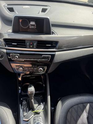 Grey BMW X1 2016 in Kaunas, with an engine capacity of 2.00 L and mileage of 245 thousand km for 12950 €, photo 13 on AUTOMOTO.COM.LV