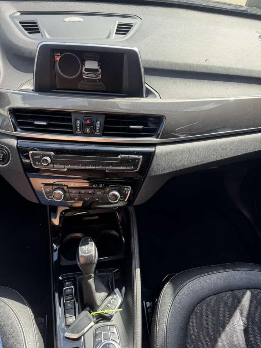 Grey BMW X1 2016 in Kaunas, with an engine capacity of 2.00 L and mileage of 245 thousand km for 12950 €, photo 13 on AUTOMOTO.COM.LV