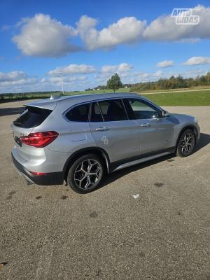 Grey BMW X1 2016 in Ukmerge, with an engine capacity of 2.00 L and mileage of 142 thousand km for 16499 €, photo 5 on AUTOMOTO.COM.LV