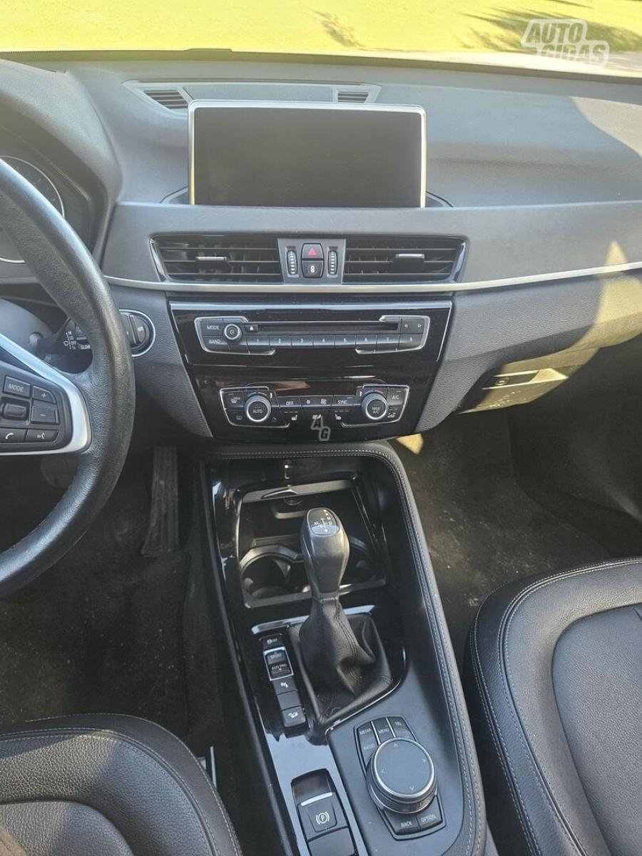 Grey BMW X1 2016 in Ukmerge, with an engine capacity of 2.00 L and mileage of 142 thousand km for 16499 €, photo 16 on AUTOMOTO.COM.LV