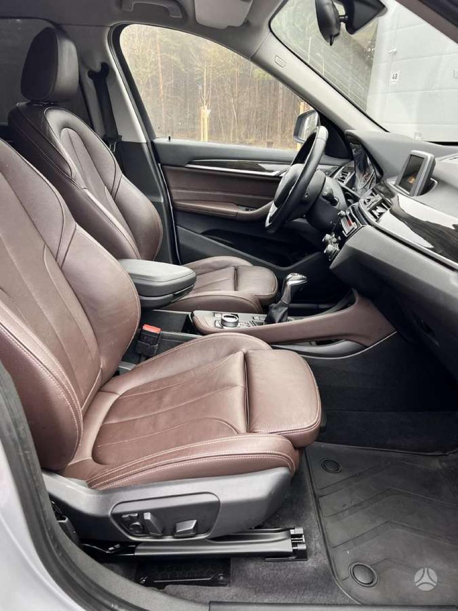 Grey BMW X1 2017 in Utena, with an engine capacity of 2.00 L and mileage of 299 thousand km for 11890 €, photo 27 on AUTOMOTO.COM.LV