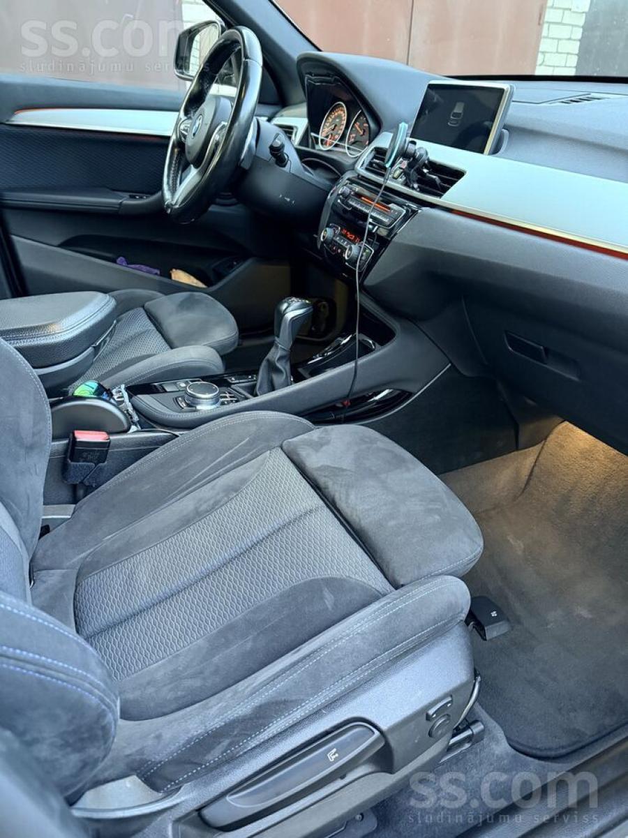 Grey BMW X1 2017 in Riga, with an engine capacity of 2.00 L and mileage of 217 thousand km for 17000 €, photo 12 on AUTOMOTO.COM.LV