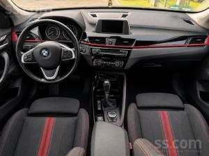 Grey BMW X1 2017 in Riga, with an engine capacity of 2.00 L and mileage of 239 thousand km for 13395 €, photo 8 on AUTOMOTO.COM.LV